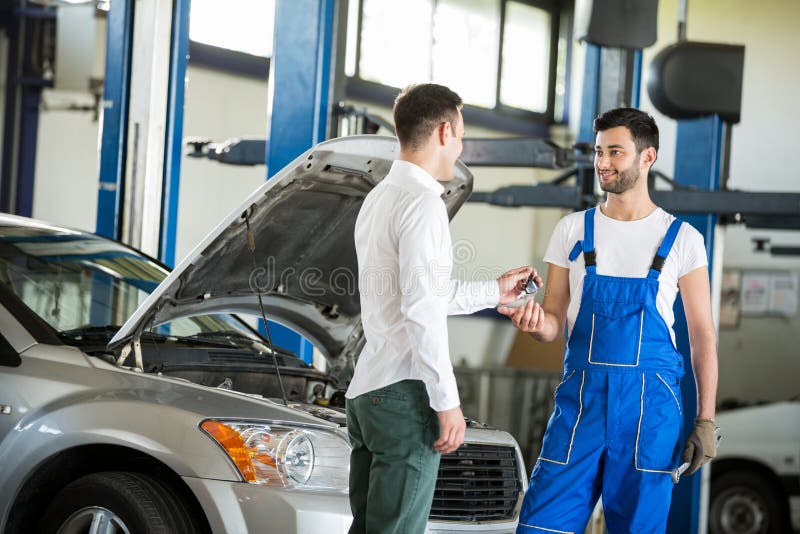 Mechanic Discussing with Customer Stock Image - Image of engineer ...