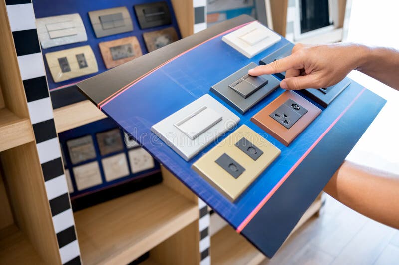 Customer Hand Pointing and Choosing Light Switch and Electric Socket on ...