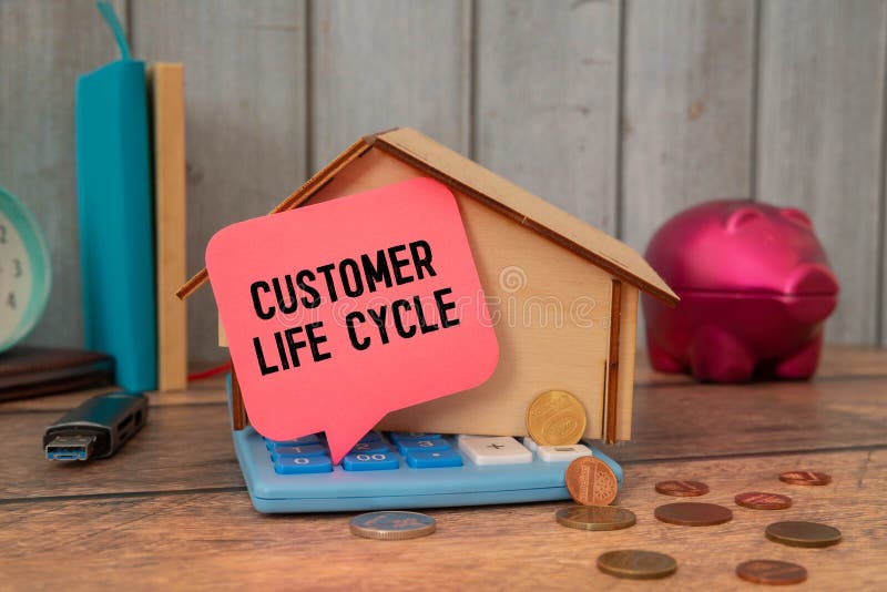 CUSTOMER LIFE CYCLE Text on a Blue Background with Keyboard and ...