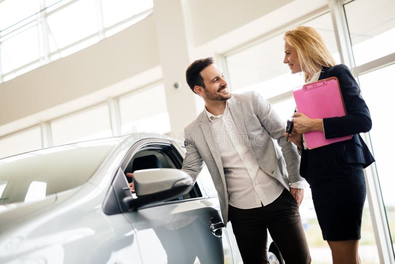 Customer Looking for a Car at Dealership Stock Image - Image of ...