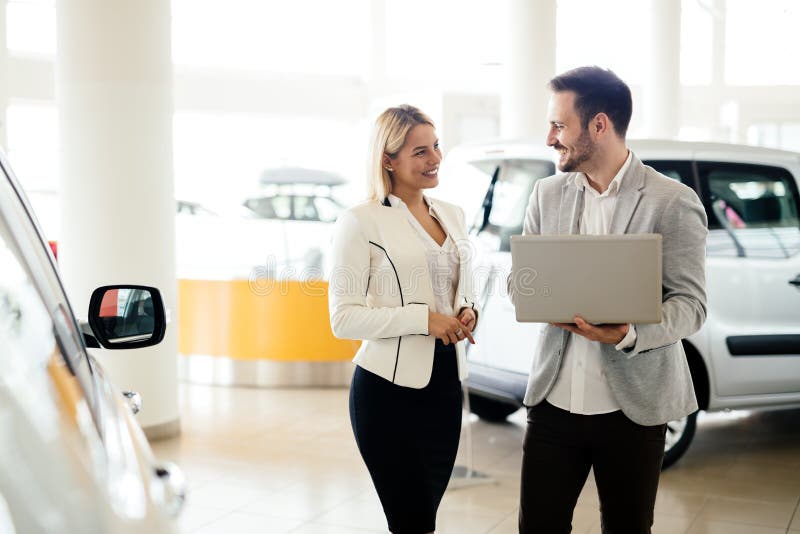 Customer Looking for a Car at Dealership Stock Photo - Image of ...