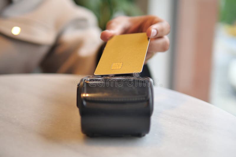 Customer Makes a Contactless Payment at a Cafe Table in the Afternoon ...