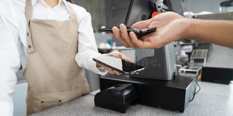 Contactless Mobile Payment at Modern Retail Store Counter with Customer ...
