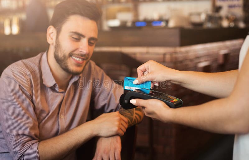 Customer Making Payment Using Credit Card Stock Photo - Image of blue ...