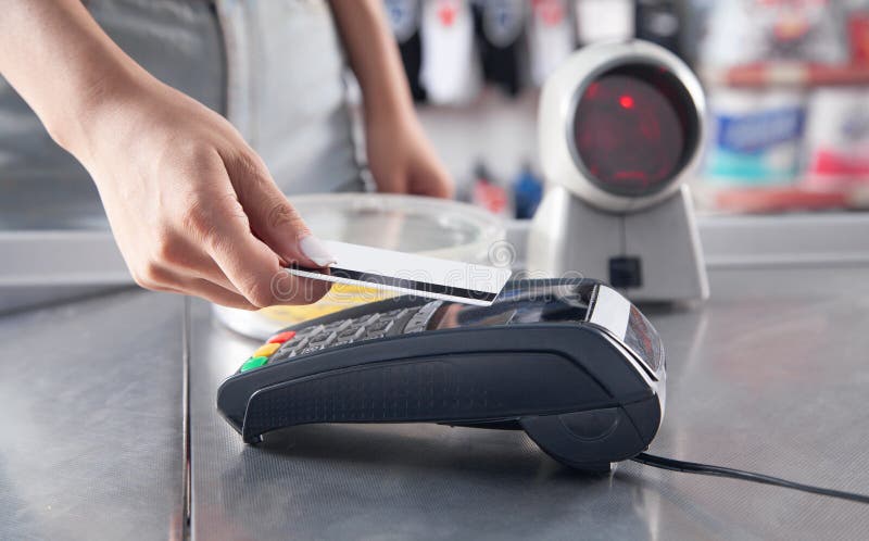 Customer Making Payment Using Credit Card in a Supermarket Stock Photo ...