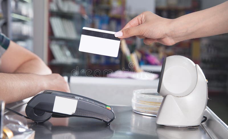Customer Making Payment Using Credit Card in a Supermarket Stock Photo ...