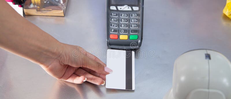 Customer Making Payment Using Credit Card in a Supermarket Stock Image ...