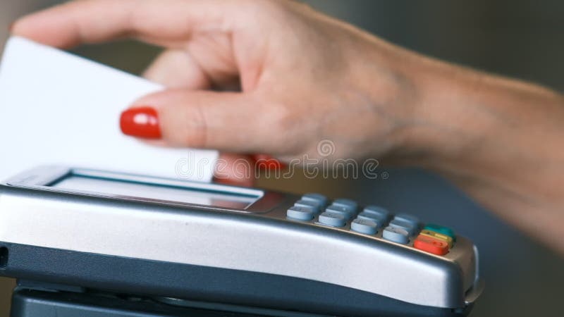 Customer is Making a Quick Payment at a Retail Checkout Using a ...