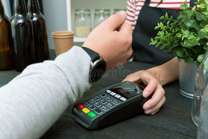 Customer Making Payment Using Credit Card in a Supermarket Stock Photo ...