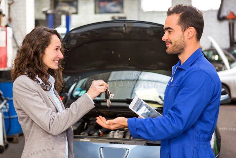 Customer and Mechanic at the Garage Stock Image - Image of garage ...