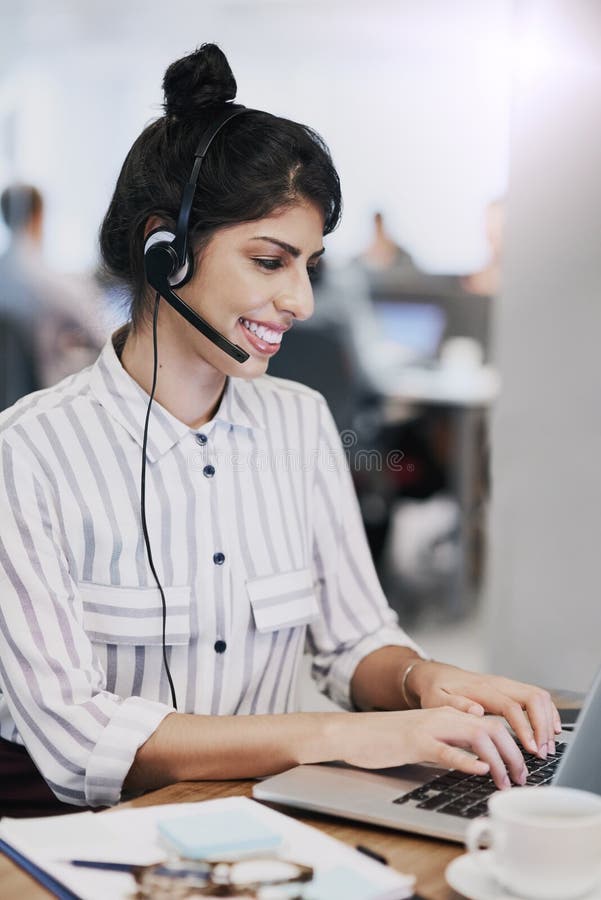 The Customer is always Our Main Focus. a Young Call Centre Agent ...
