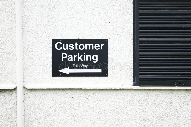 Customer Parking Direction Arrow Sign Stock Photo - Image of ...