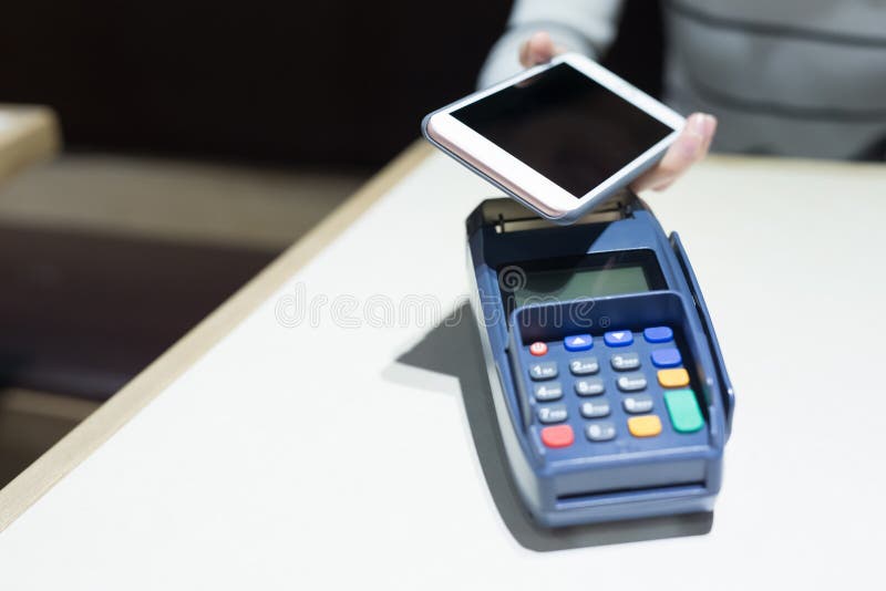 Customer pay by cellphone stock image. Image of mall - 70546487