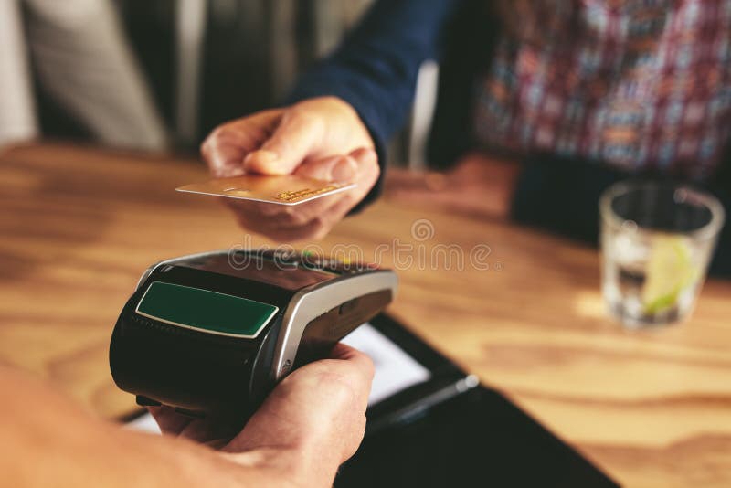 Customer Making Payment Using Credit Card at Bar Stock Image - Image of ...