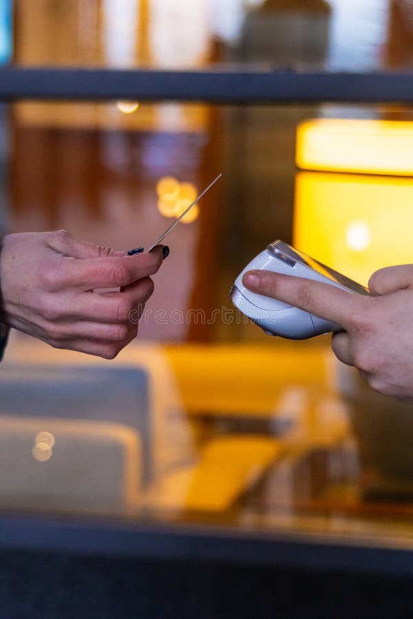 Customer Paying with Contactless Credit Card at Pos Terminal Stock ...