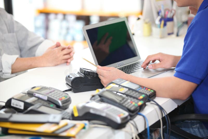 Customer Paying with Credit Card with Technology. Credit Card Reader ...