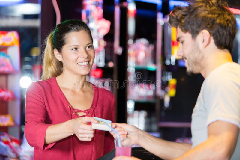 Customer paying his bill stock photo. Image of equipment - 243806396