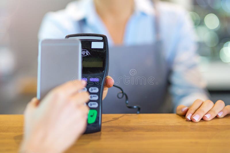 Customer Paying through Mobile Phone Stock Image - Image of paying ...