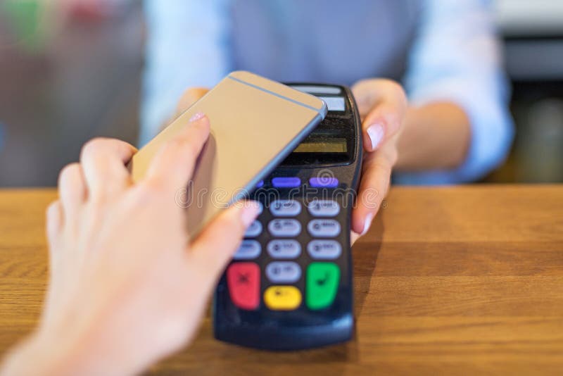 Customer Paying through Mobile Phone Stock Image - Image of paying ...