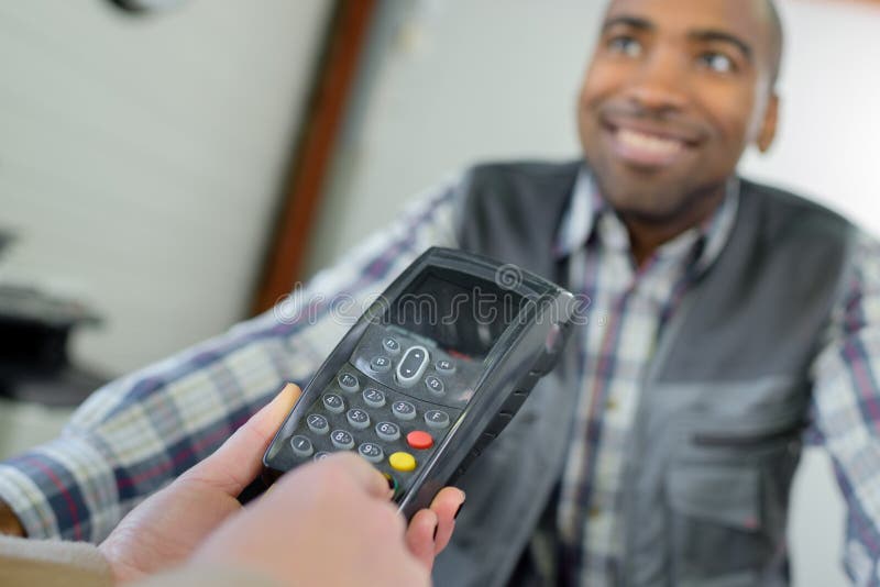 Customer Paying for Services by Card at Till Stock Photo - Image of ...