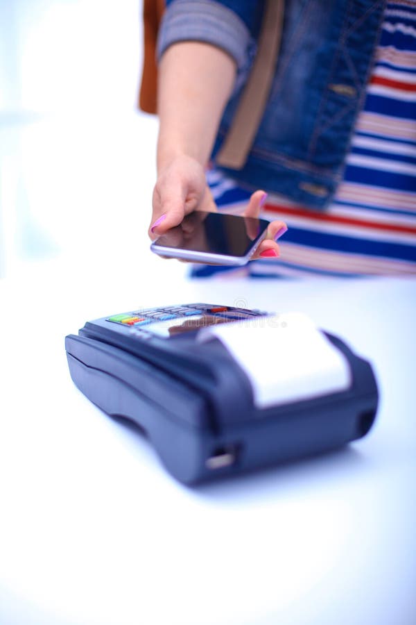 Customer is Paying with Smartphone in Shop Using NFC Technology. NFC ...