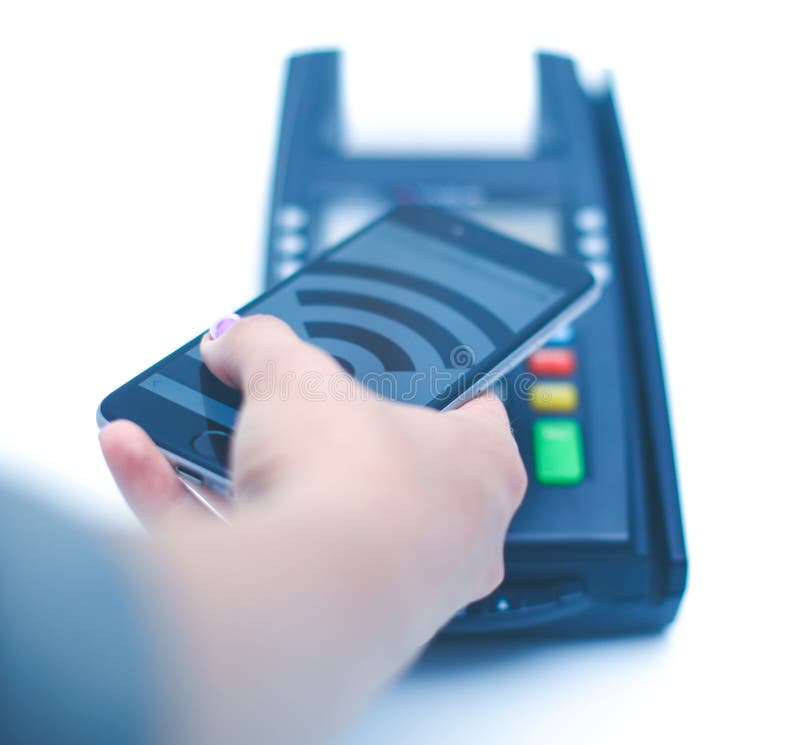 Customer is Paying with Smartphone in Shop Using NFC Technology. NFC ...