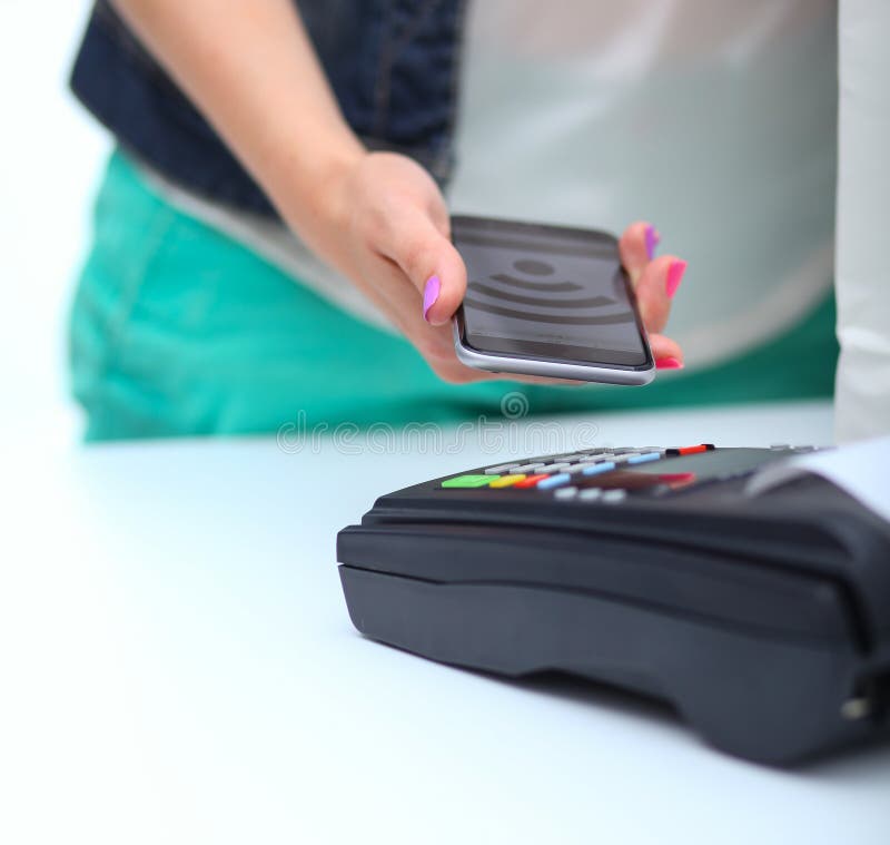 Customer is Paying with Smartphone in Shop Using NFC Technology. NFC ...