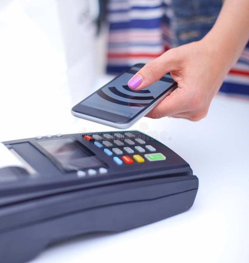 Customer is Paying with Smartphone in Shop Using NFC Technology. NFC ...
