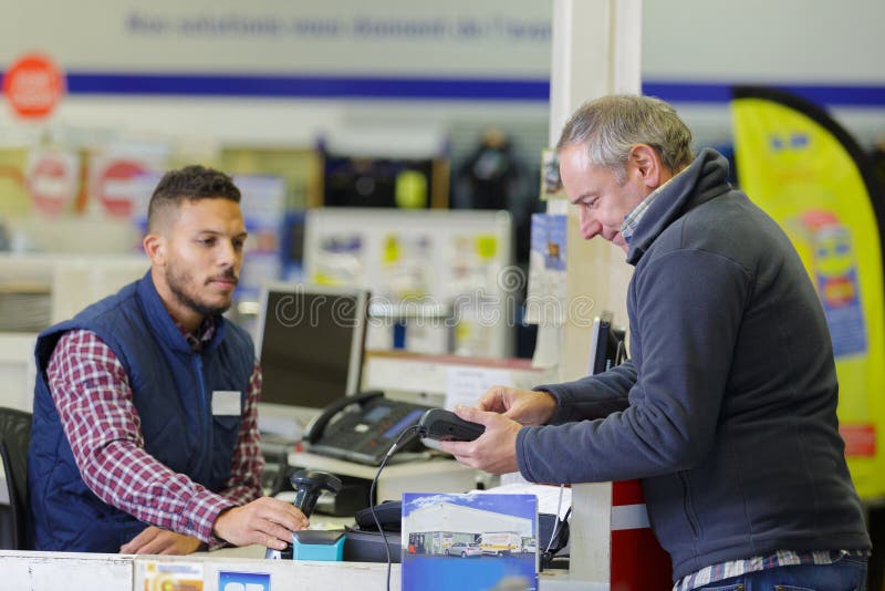 Customer Paying at Warehouse Store Stock Photo - Image of store ...