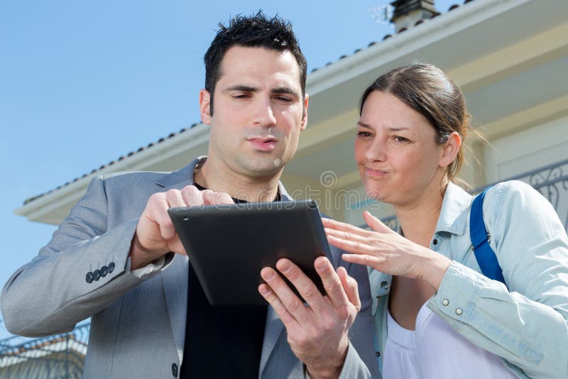 Customer and Realtor Using Tablet Outside Stock Image - Image of ...