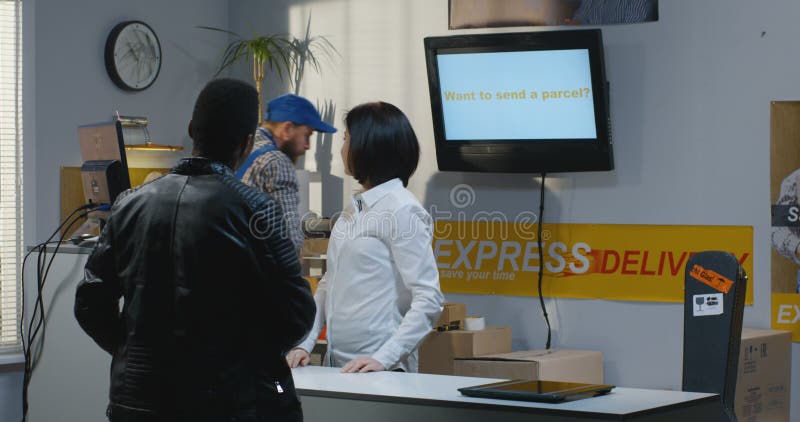 Customer Receiving Package at a Customer Service Desk Stock Video ...