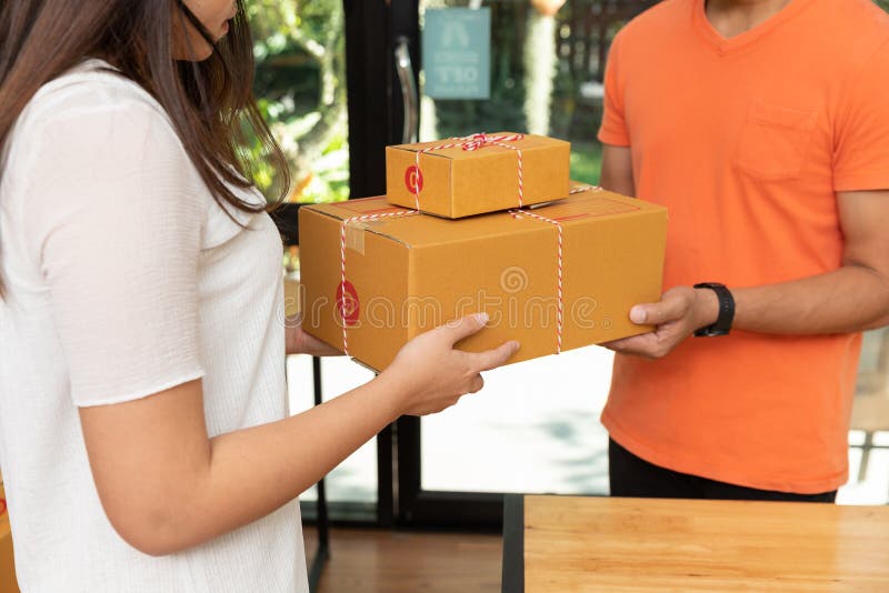 Customer Receiving Parcel from Delivery Courier at Home Stock Image ...