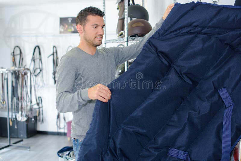 Customer in riding store stock photo. Image of riding - 127757364