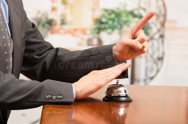 Customer Ringing Hotel Bell at Reception Desk Stock Photo - Image of ...