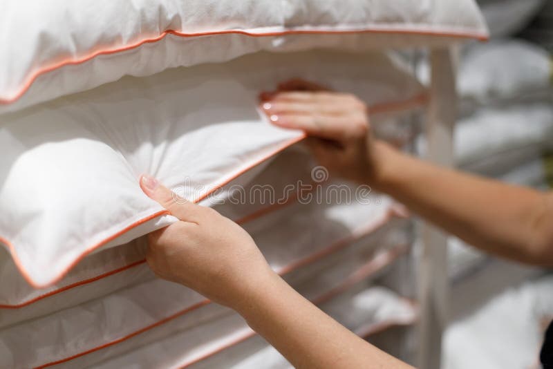The Customer S Hands Hold a Pillow in the Store. Sale Stock Image ...