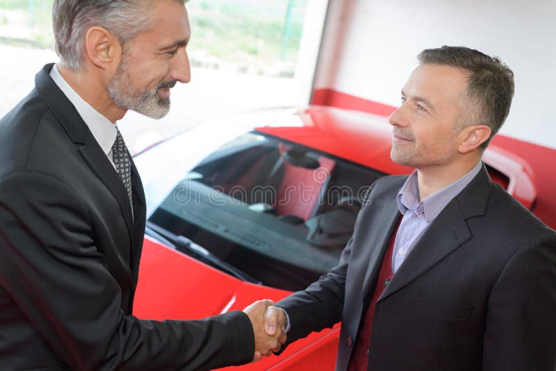 Customer and Salesman Shaking Hands Stock Image - Image of auto, buyer ... Customer and Salesman Shaking Hands Stock Image - Image of auto, buyer ...