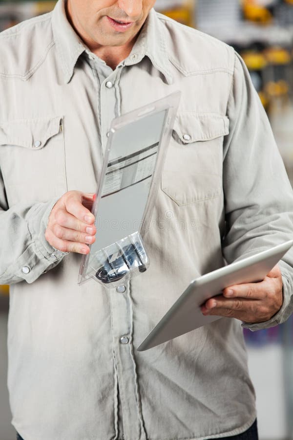 Man Scanning Product Tablet Computer Stock Photos - Free & Royalty-Free ...