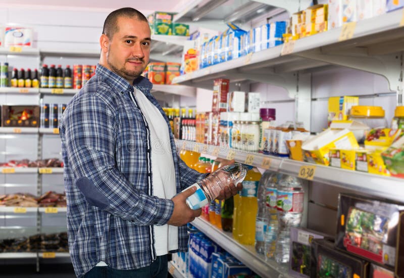 Customer Selecting Bottle of Water Stock Image - Image of plastic ...
