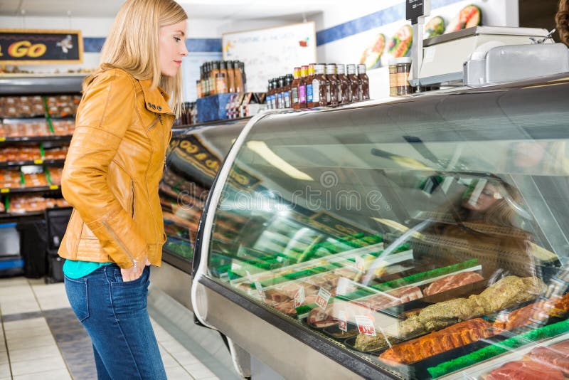 Customer Selecting Meat at Butcher S Shop Stock Photo - Image of ...