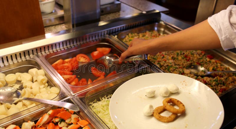 Customer of a Self-service Restaurant Serving His Plate Stock Image ...