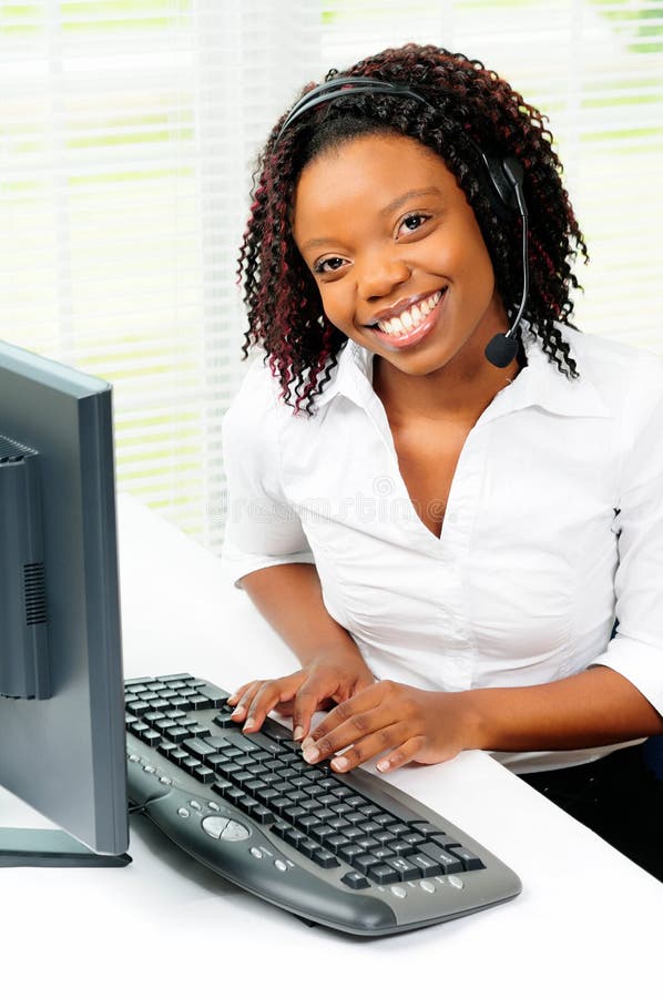 Friendly Customer Service Rep Stock Photo - Image of typing, desk: 2394330
