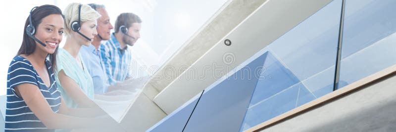 Customer Service Assistants with Headsets with Bright Office Windows ...