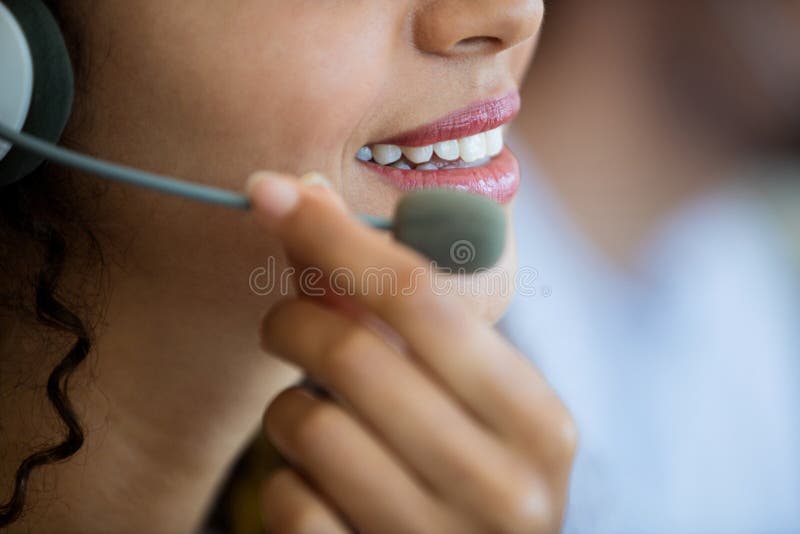 Customer Service Executive Adjusting Her Mic Stock Photos - Free ...