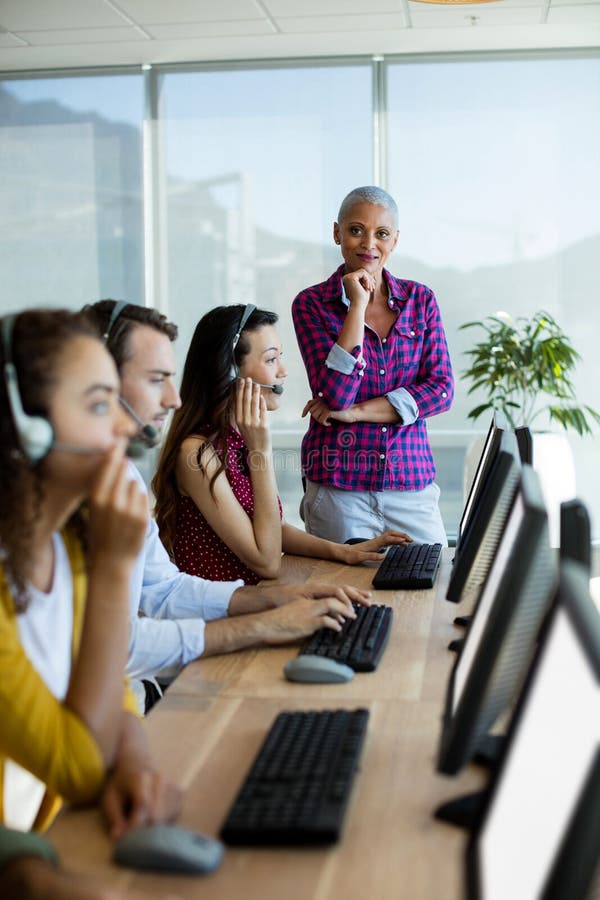 Customer Service Executive Trainer Monitoring Her Team Stock Image ...