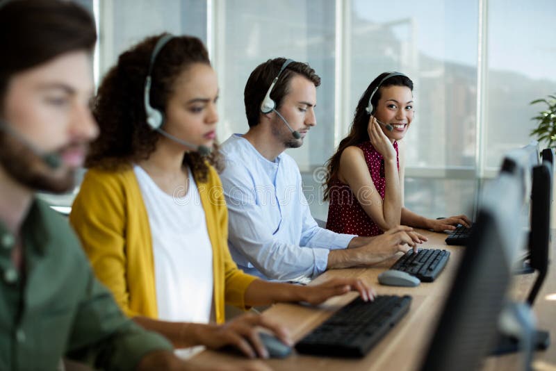 Customer Service Executive Trainer Assisting Her Team Stock Photo ...