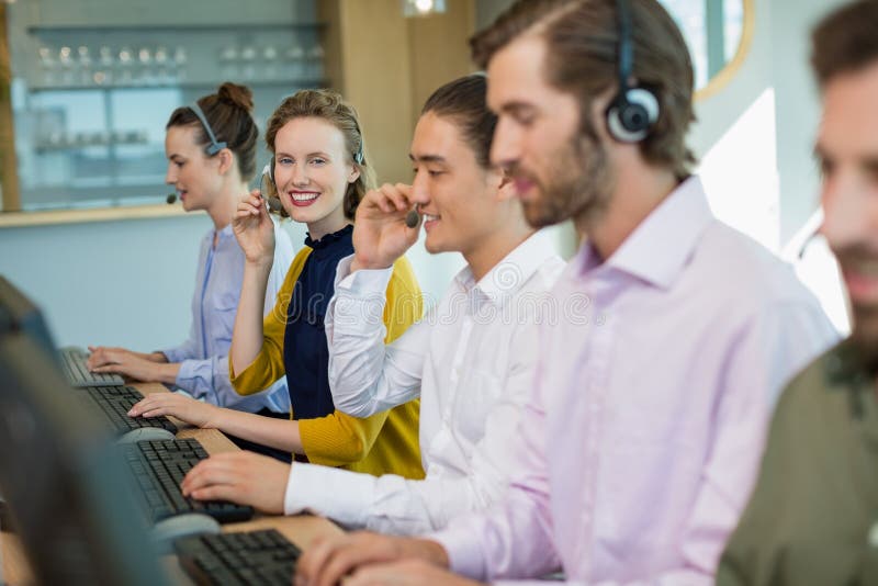 Customer Service Executives Working in Call Center Stock Photo - Image ...