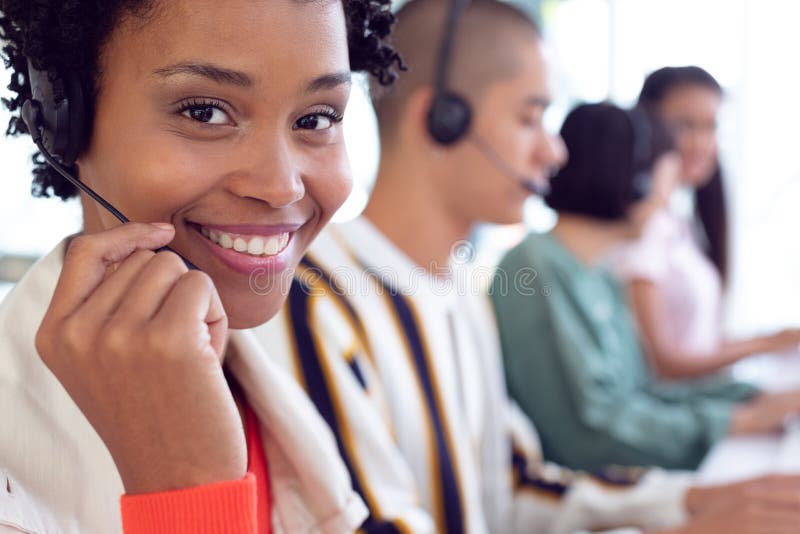 Customer Service Executives Working on Computer at Desk Stock Image ...