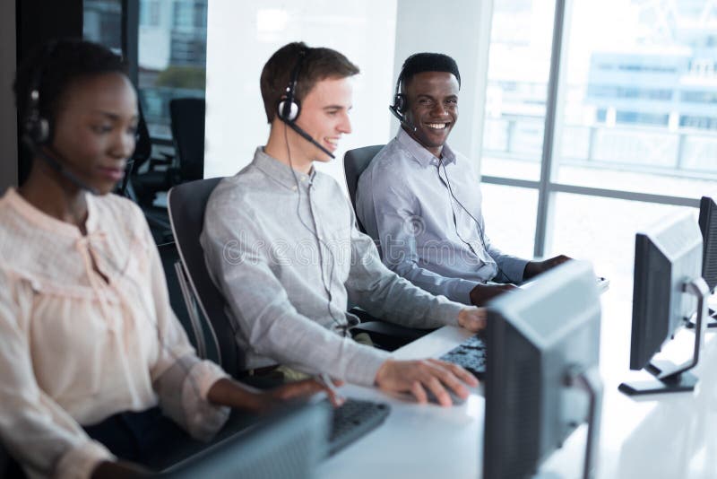 Customer Service Executives Working at Office Stock Image - Image of ...