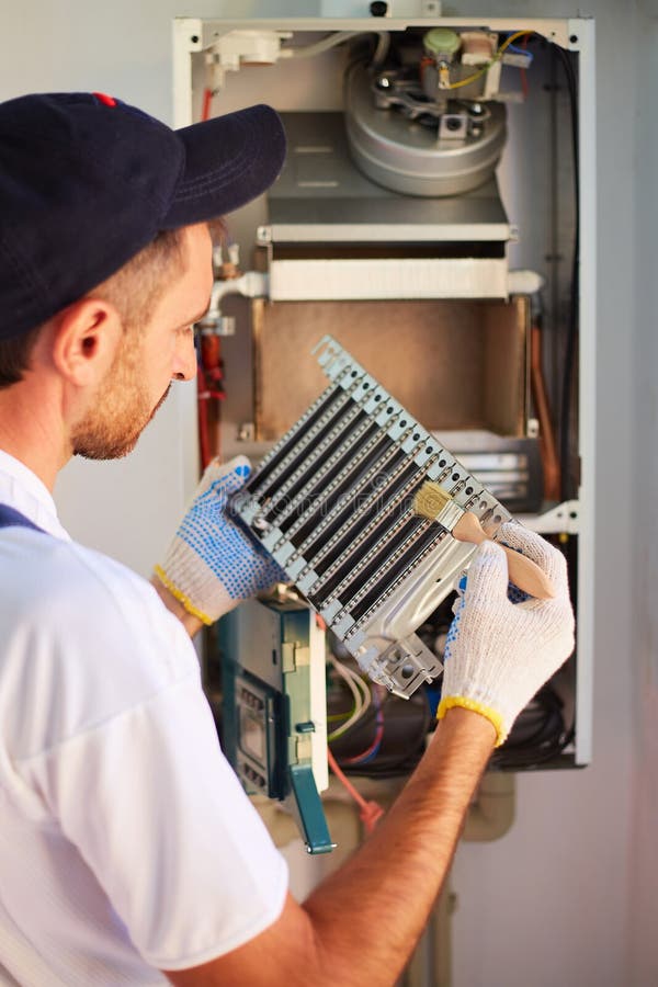 Repair of a Gas Boiler, Setting Up and Servicing by a Service ...