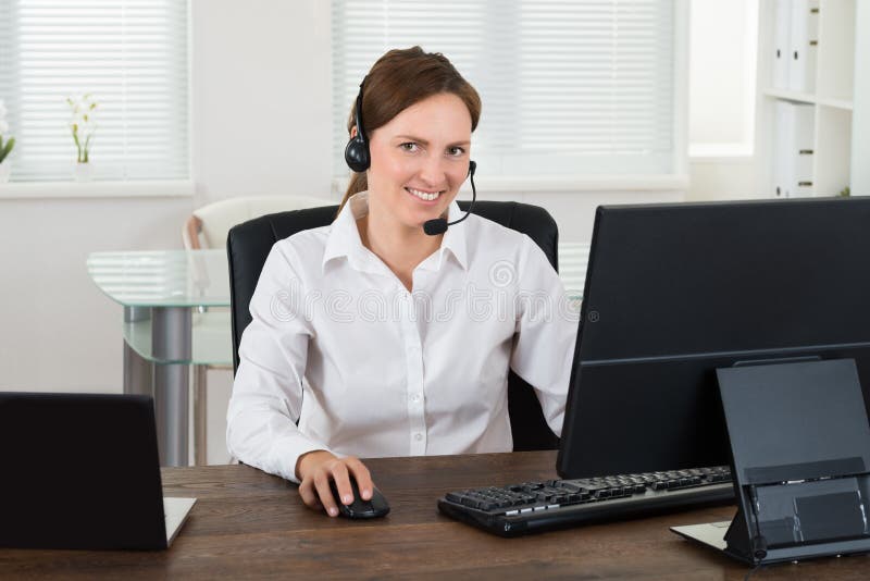 Customer Service Representative Working on Computer Stock Photo - Image ...